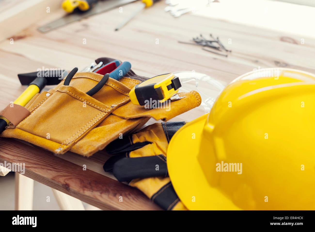 Builders hand measuring tape hi-res stock photography and images - Alamy