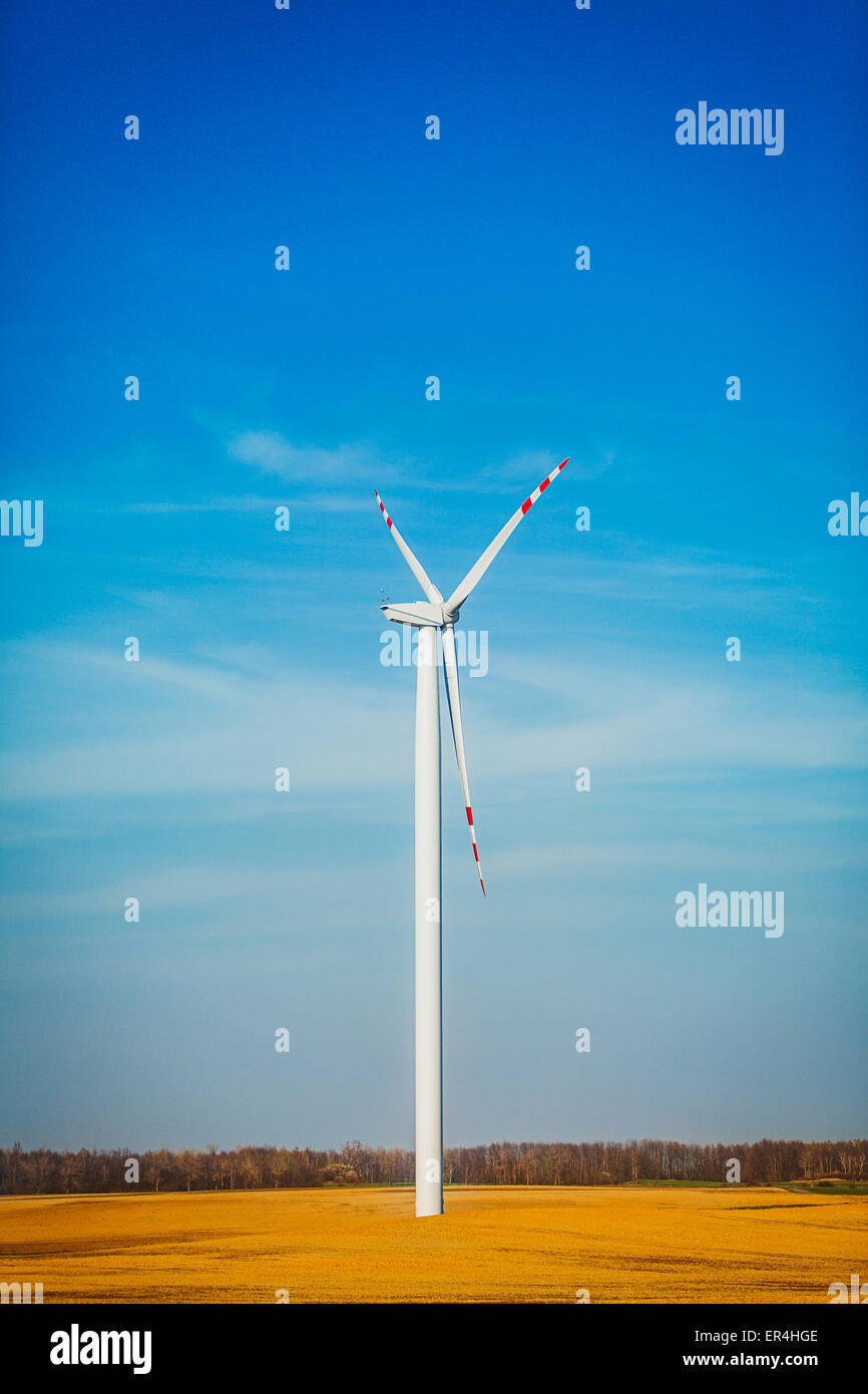 Rolling wind turbine in summer time. Legnickie Pole, Poland Stock Photo ...