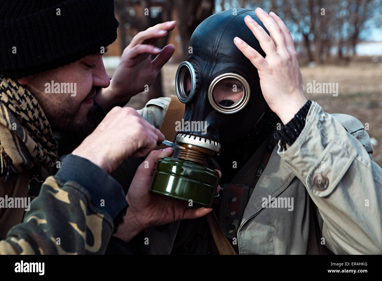 Combat getting equipped with the gas mask Stock Photo - Alamy
