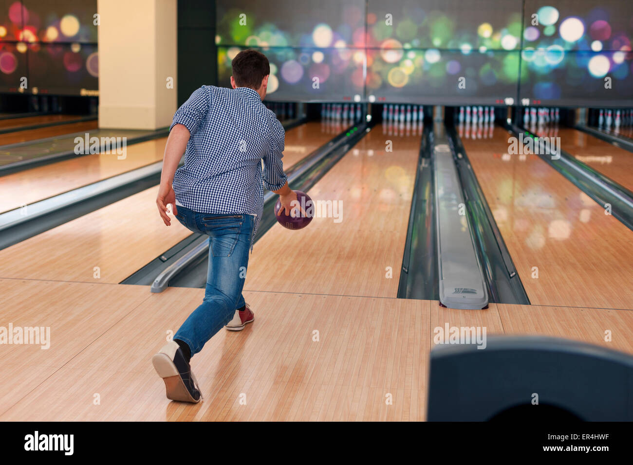 Friends hanging out at the bowling alley Stock Photo - Alamy