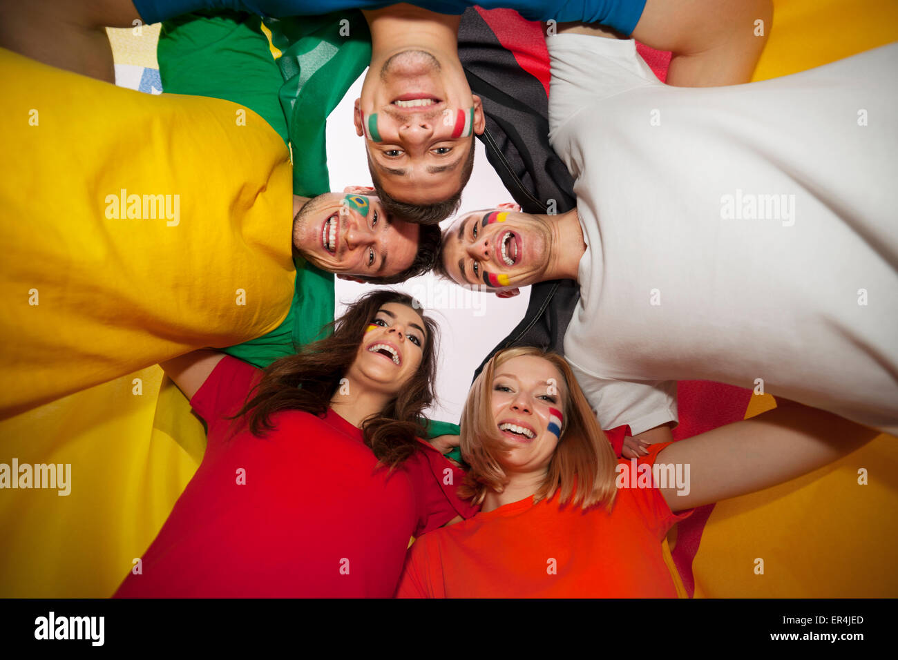 Friends watching football together Stock Photo - Alamy