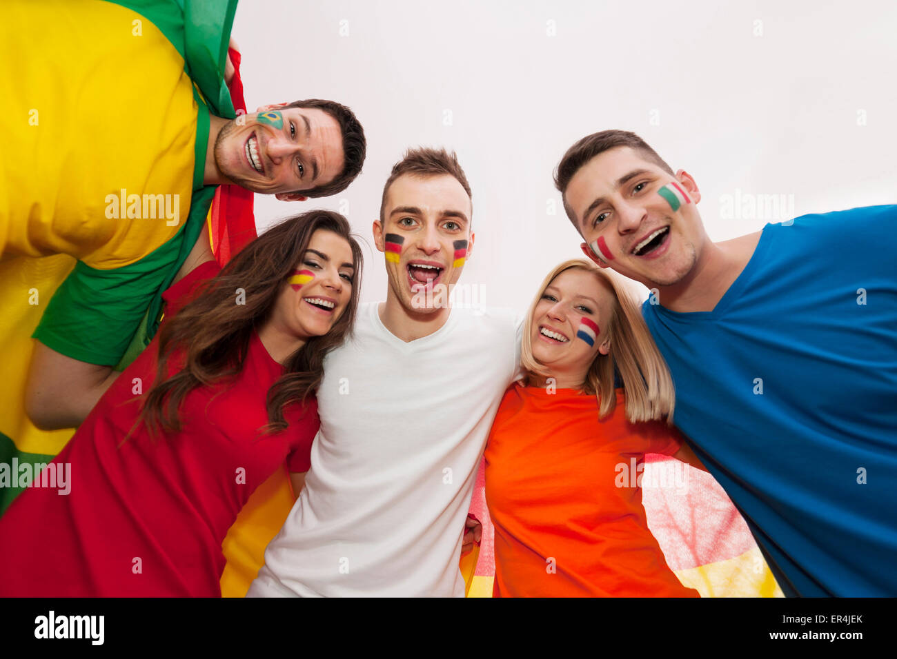 Friends watching football together Stock Photo - Alamy