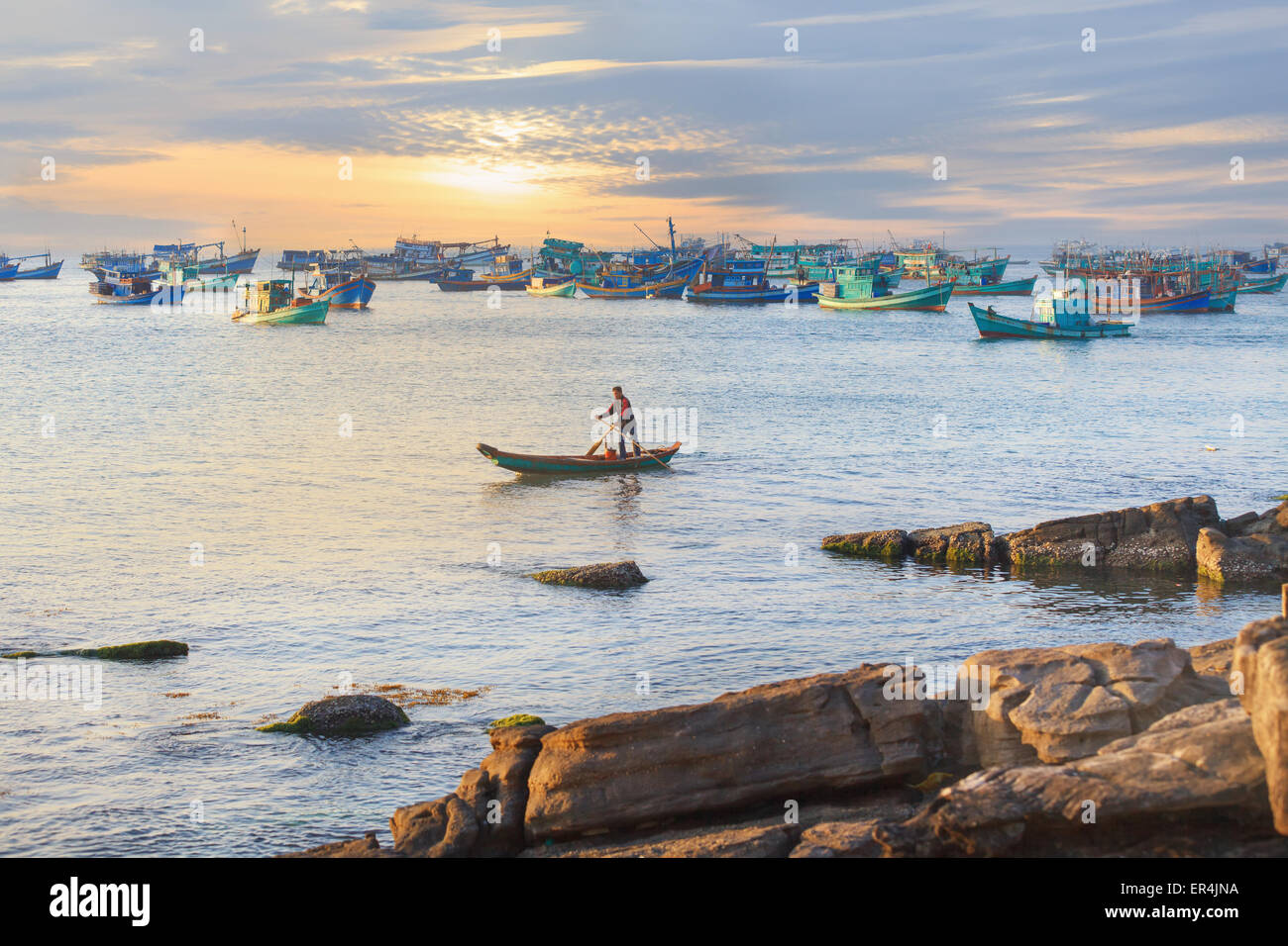 Traditional blue wooden fishing boats in the ocean, Asia Stock Photo ...