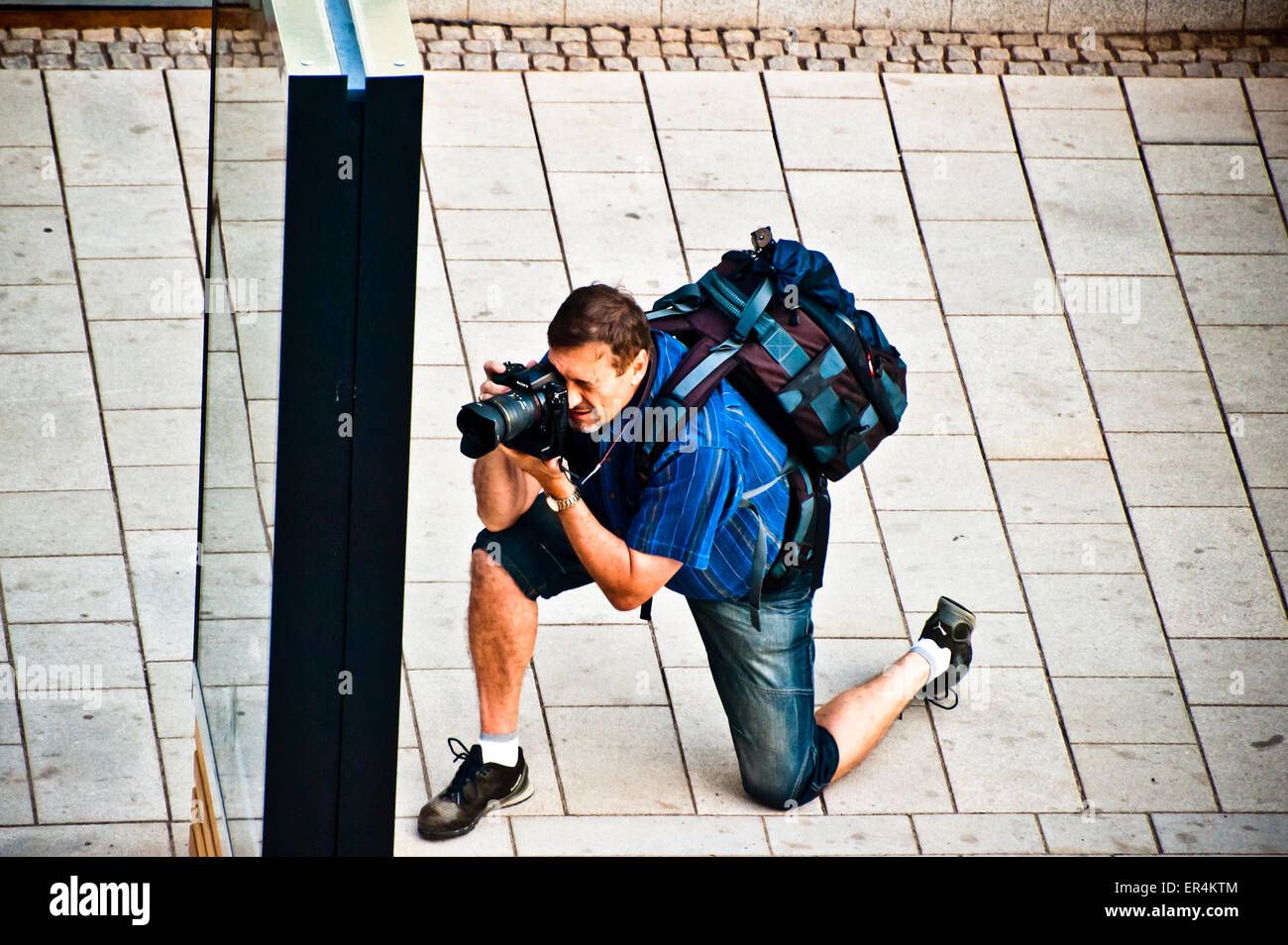 photographer taking photo Stock Photo - Alamy