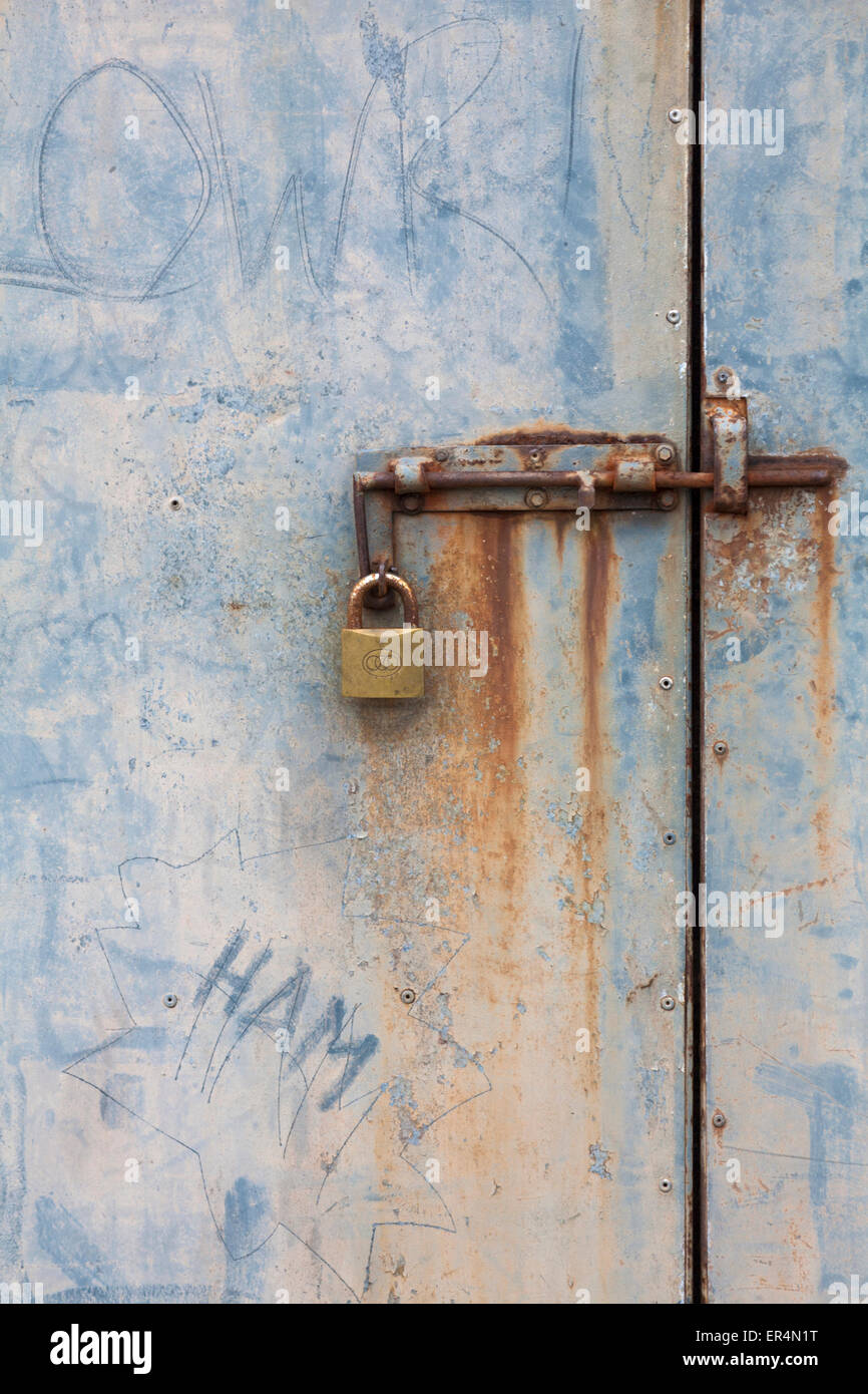 Old rusty door, lock and padlock Stock Photo - Alamy