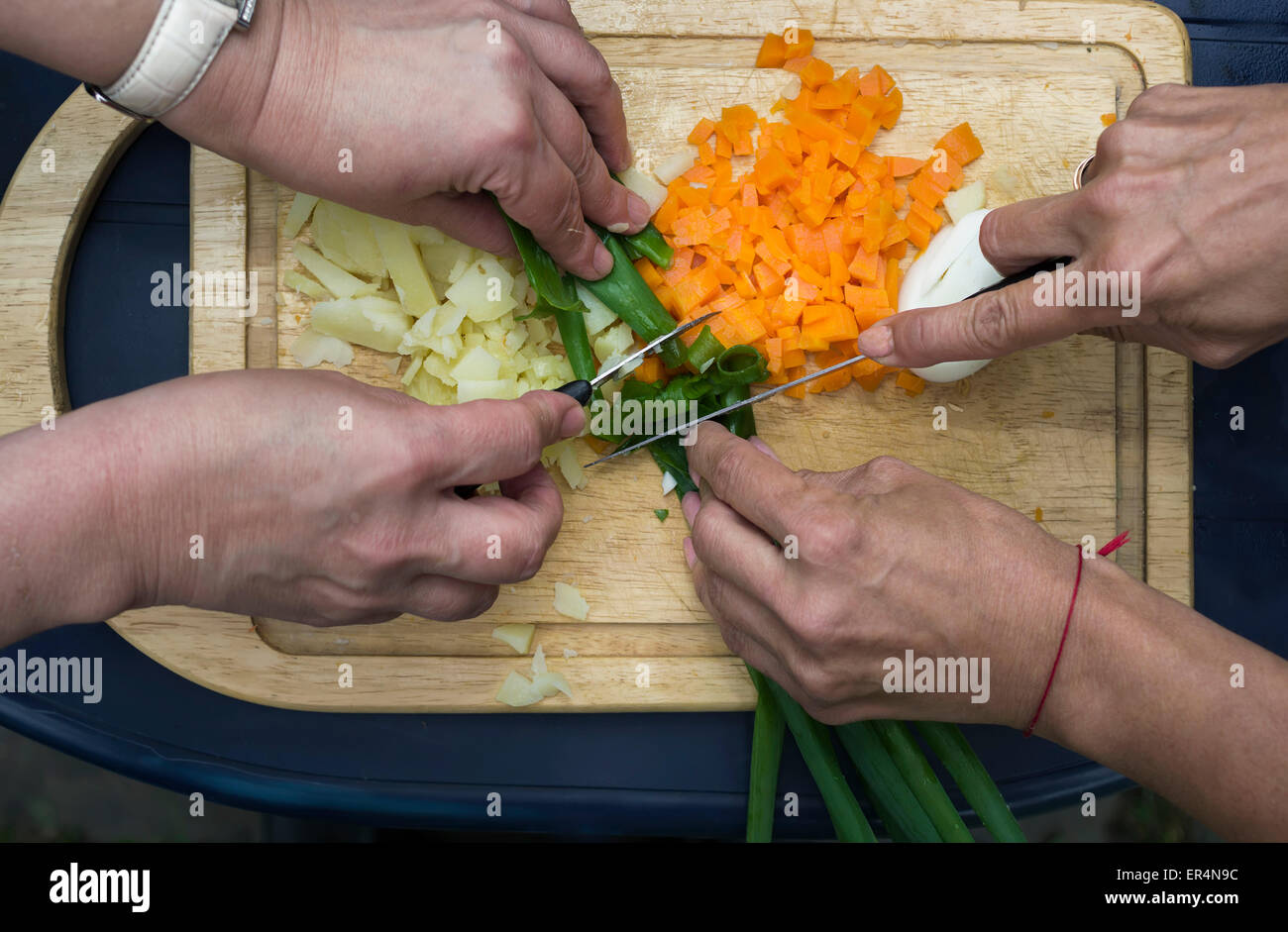 Hands chopping onion Stock Photo - Alamy