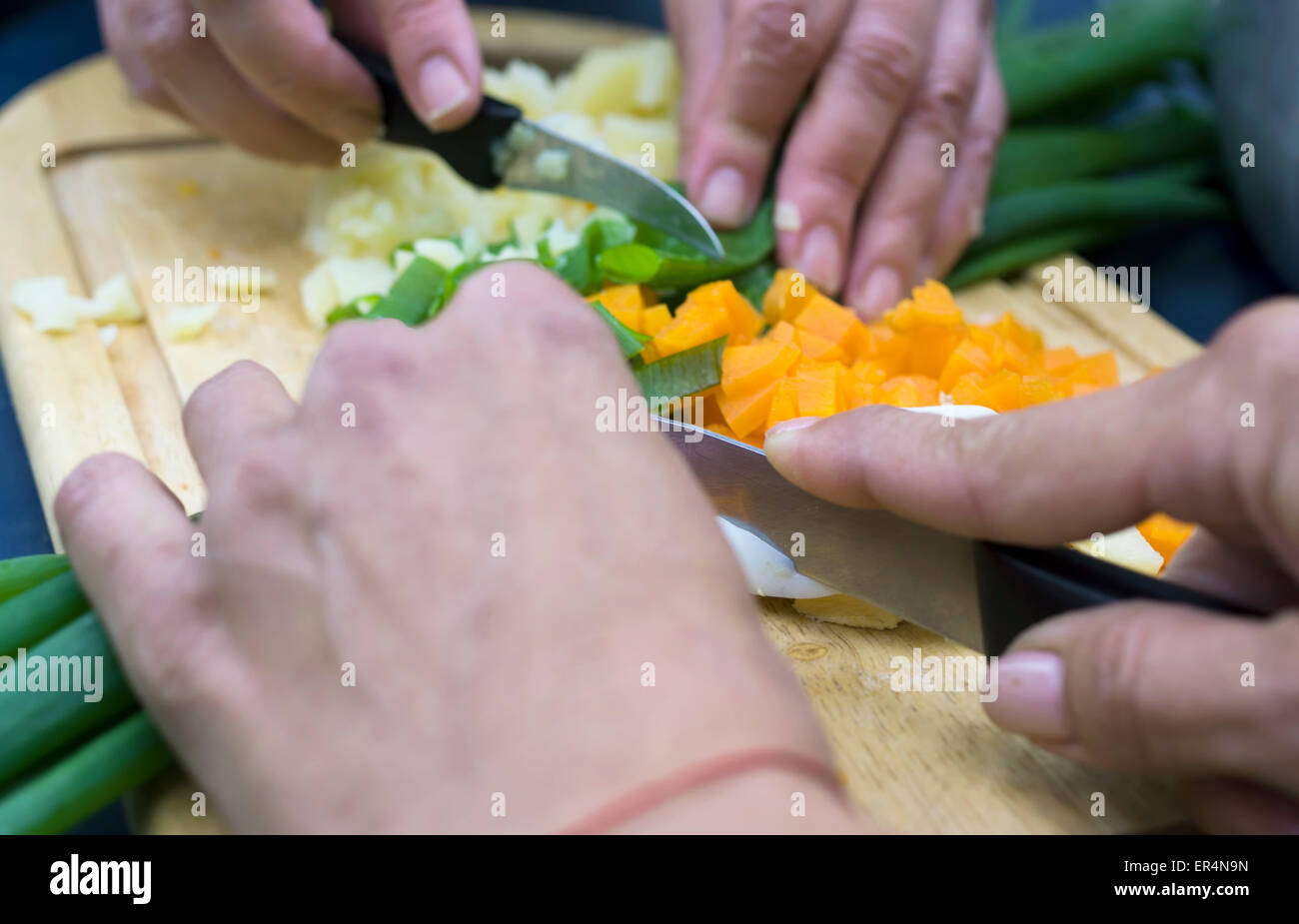 Hands chopping carrot hi-res stock photography and images - Alamy