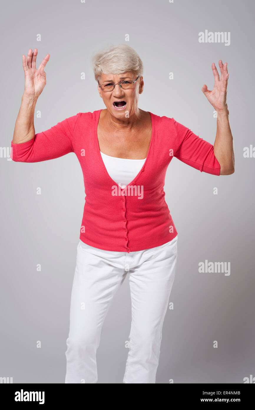 Angry older lady Stock Photo - Alamy