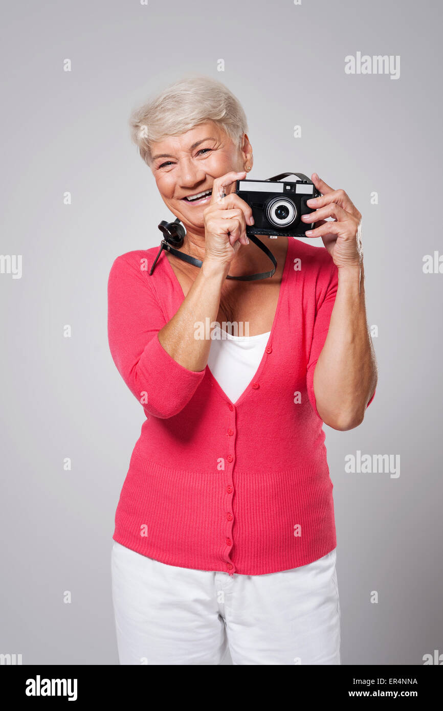 Lady with a camera Stock Photo - Alamy