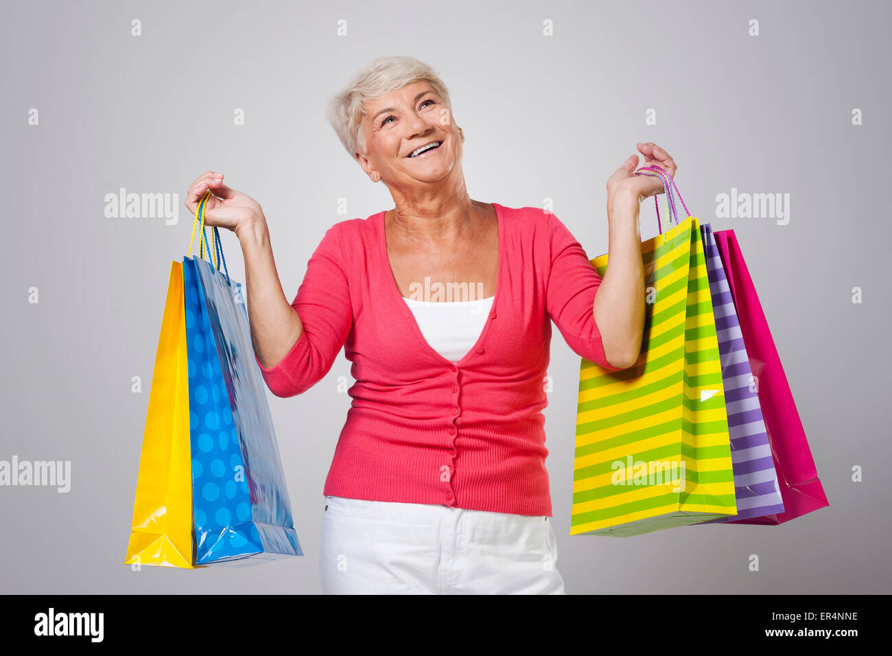Lady with bags of shopping Stock Photo - Alamy