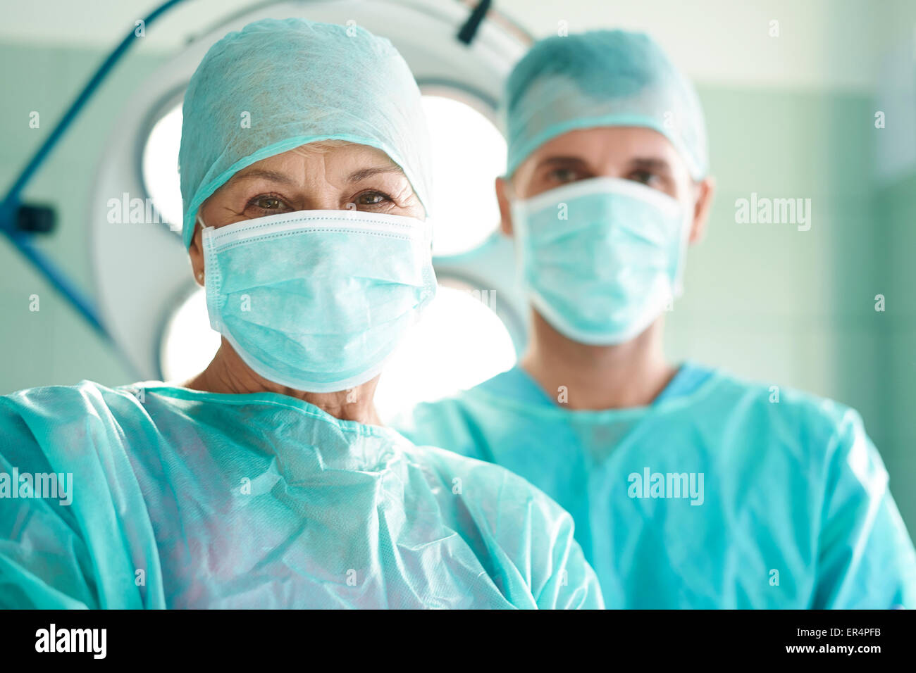 Medical team helping senior people hi-res stock photography and images ...