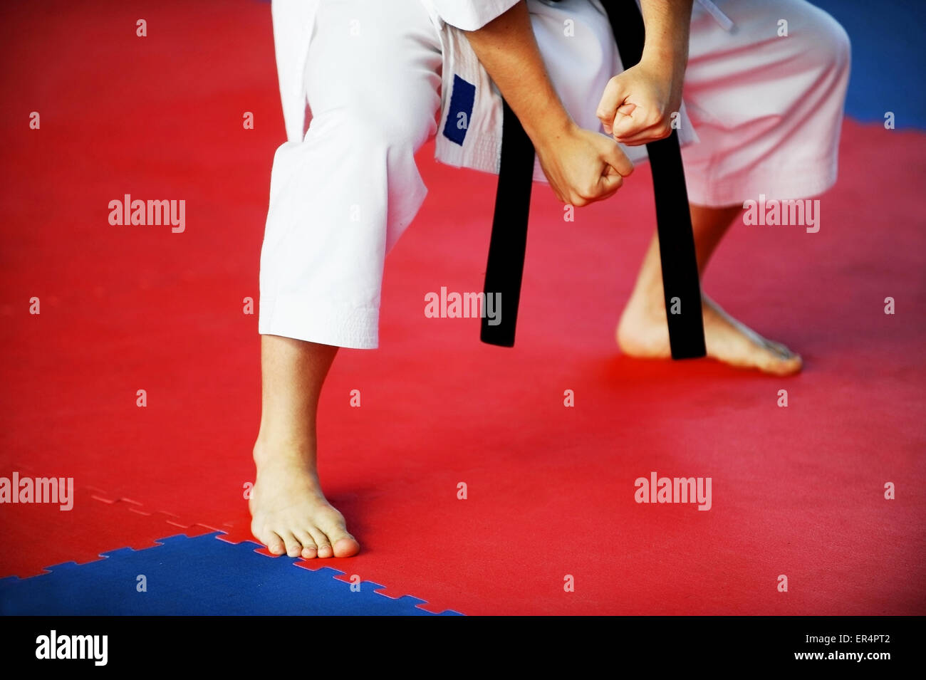 Feet of karate practitioner are seen on the competition floor Stock ...