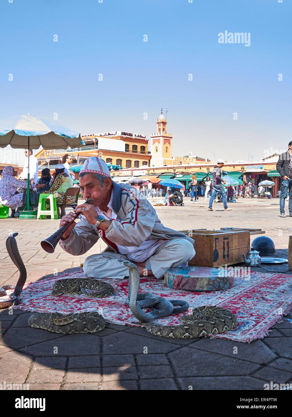 Snake Charmer in the 'Djeema el fnaa' - The very busy Marrakech market ...