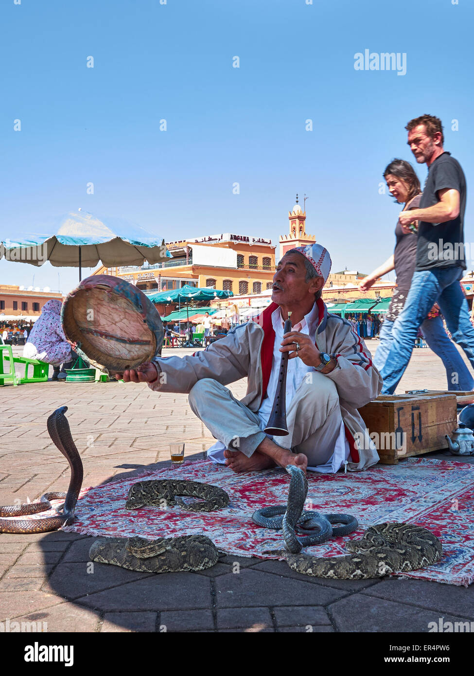 Snake Charmer in the 'Djeema el fnaa' - The very busy Marrakech market ...