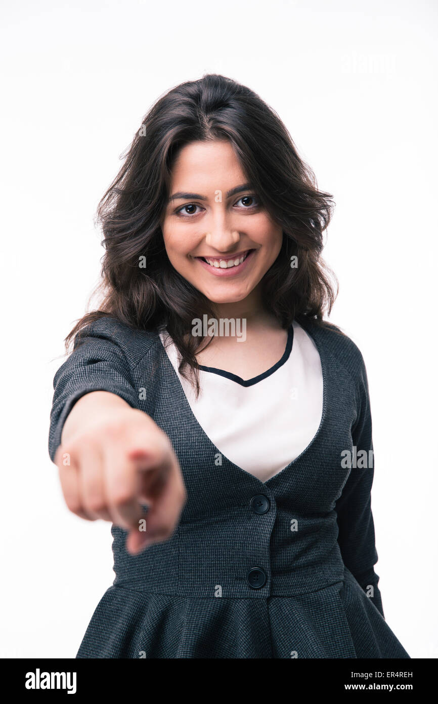 Happy businesswoman pointing finger on camera over white background ...