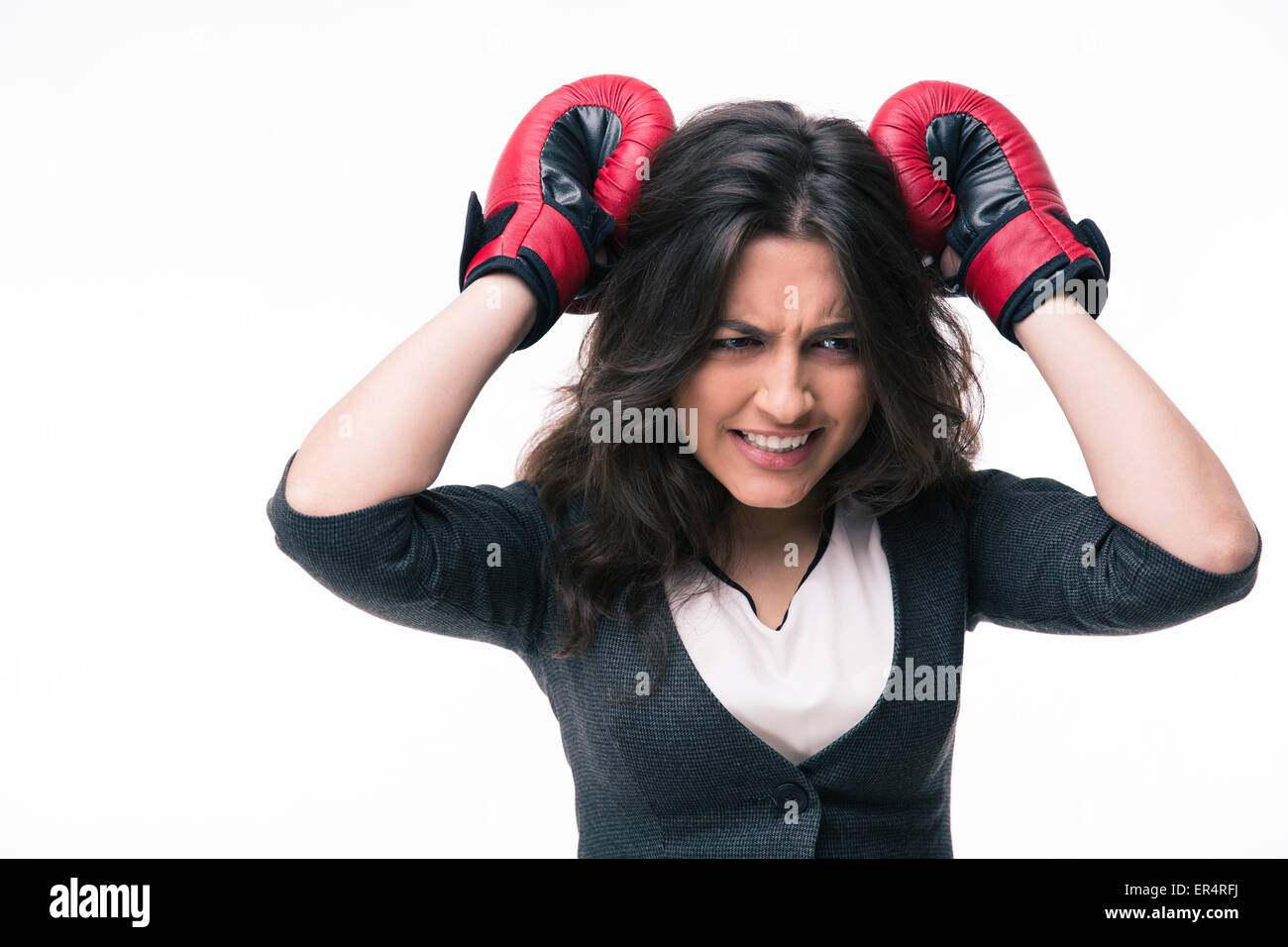 Loser businesswoman with boxing gloves isolated on a white background ...