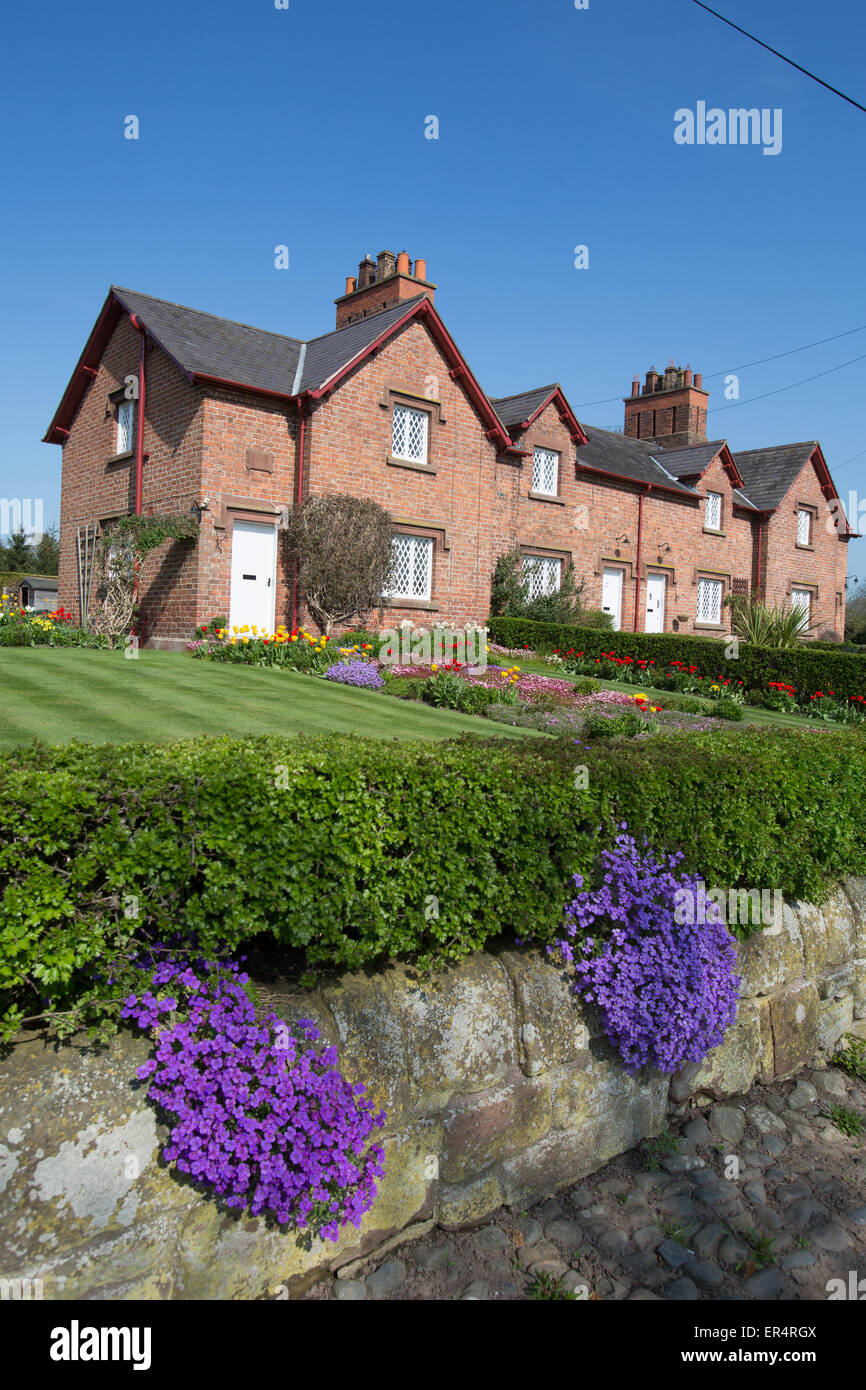 Village of Aldford, England. Picturesque spring view of an Eaton Estate ...