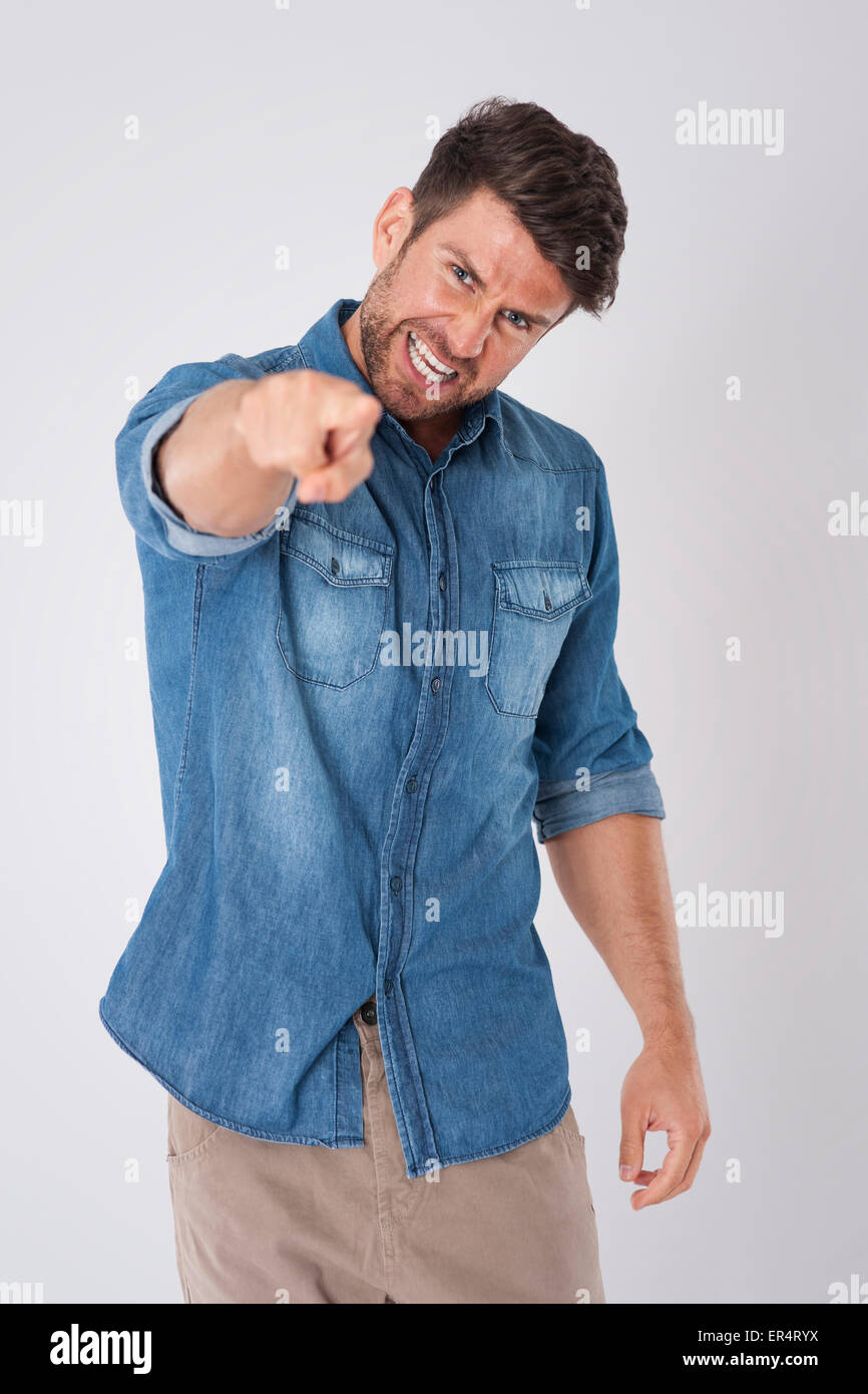 Angry man pointing at side of camera. Debica, Poland Stock Photo - Alamy