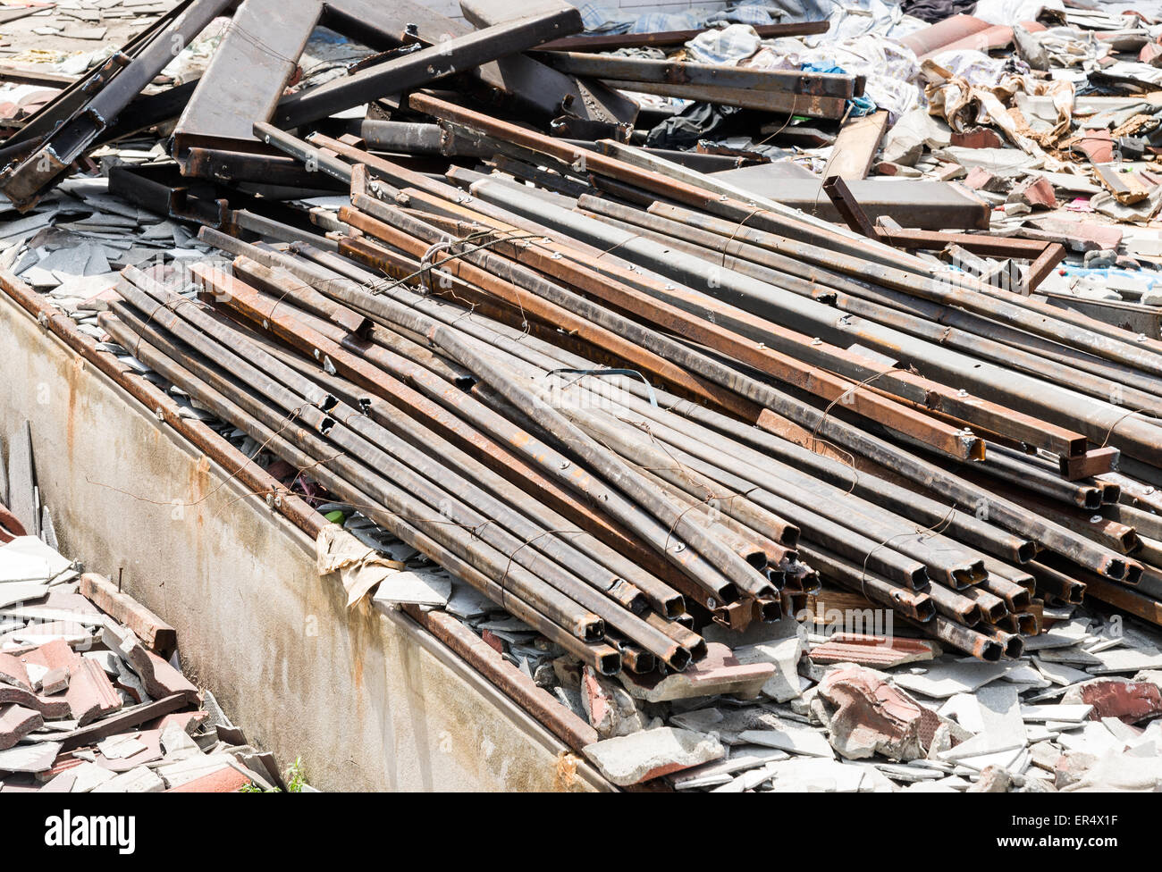 Steel pile near the demolition site of old factory Stock Photo - Alamy