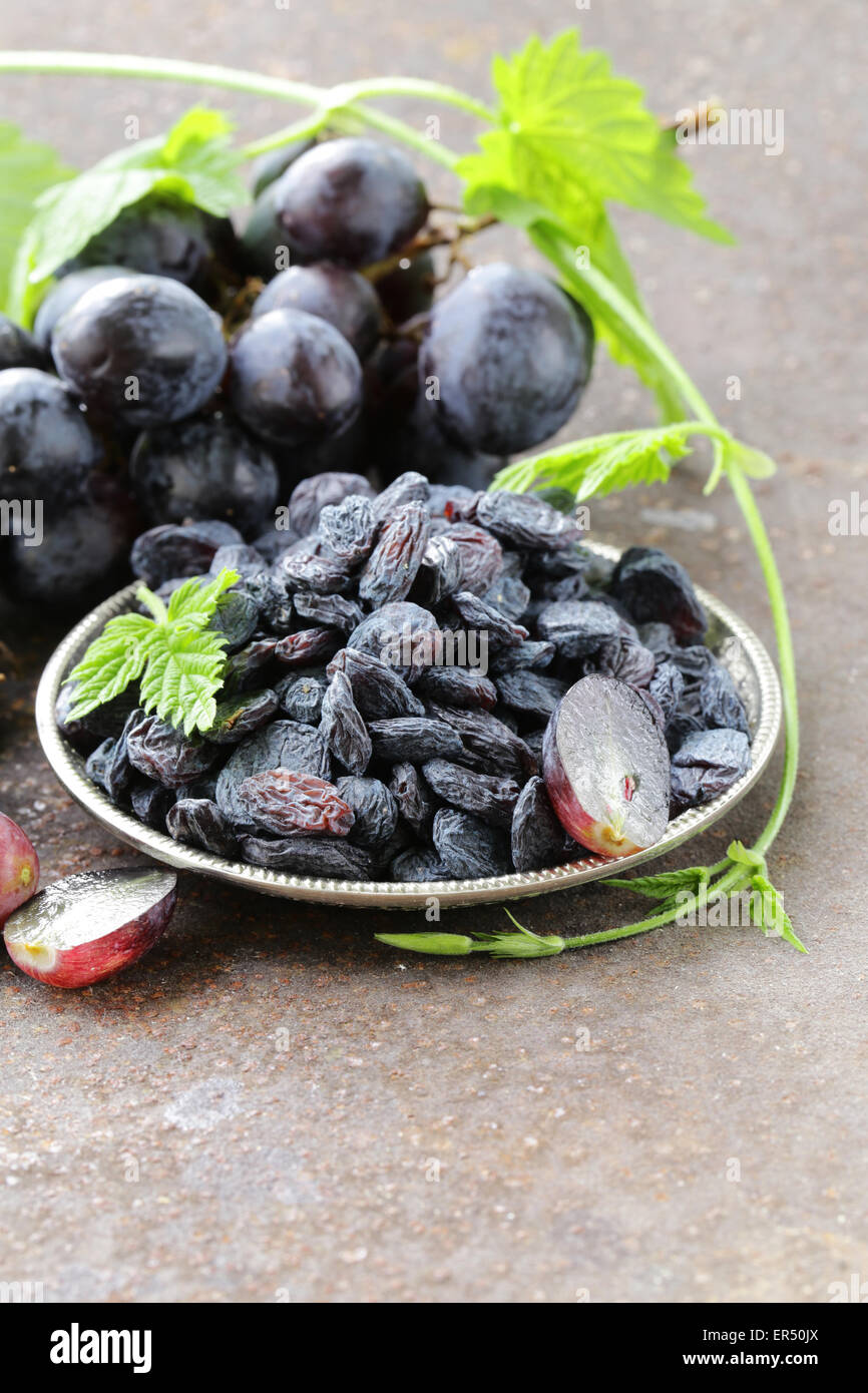 Natural organic dried grapes raisins, rustic still life Stock Photo - Alamy