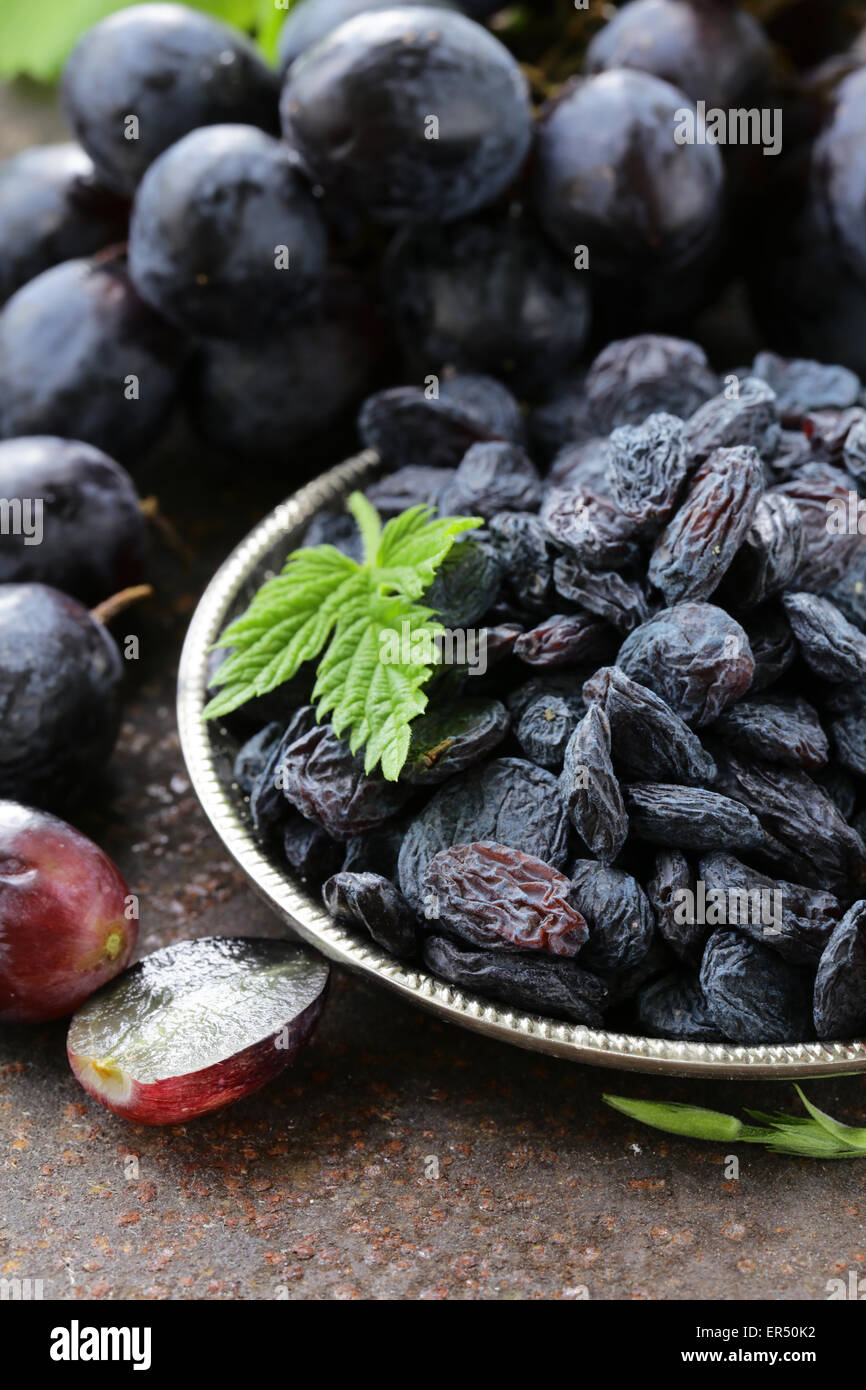 Natural organic dried grapes raisins, rustic still life Stock Photo - Alamy