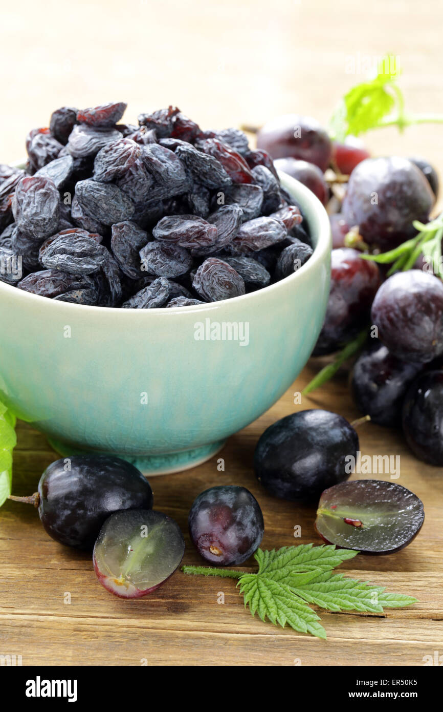 Natural organic dried grapes raisins, rustic still life Stock Photo - Alamy