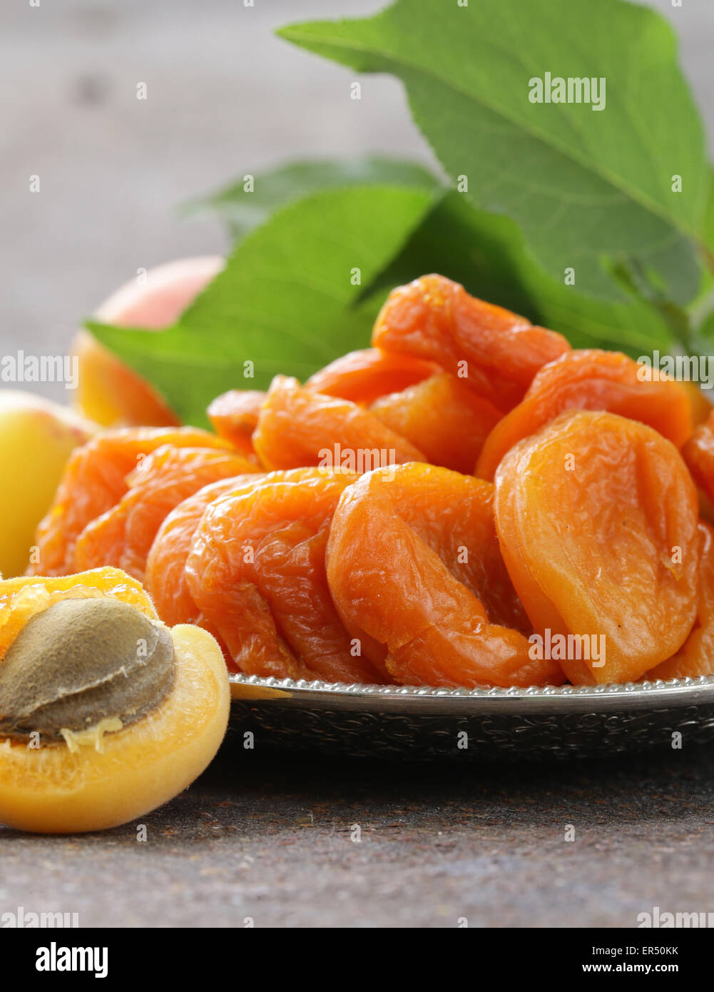 Natural organic dried apricots, rustic still life Stock Photo - Alamy