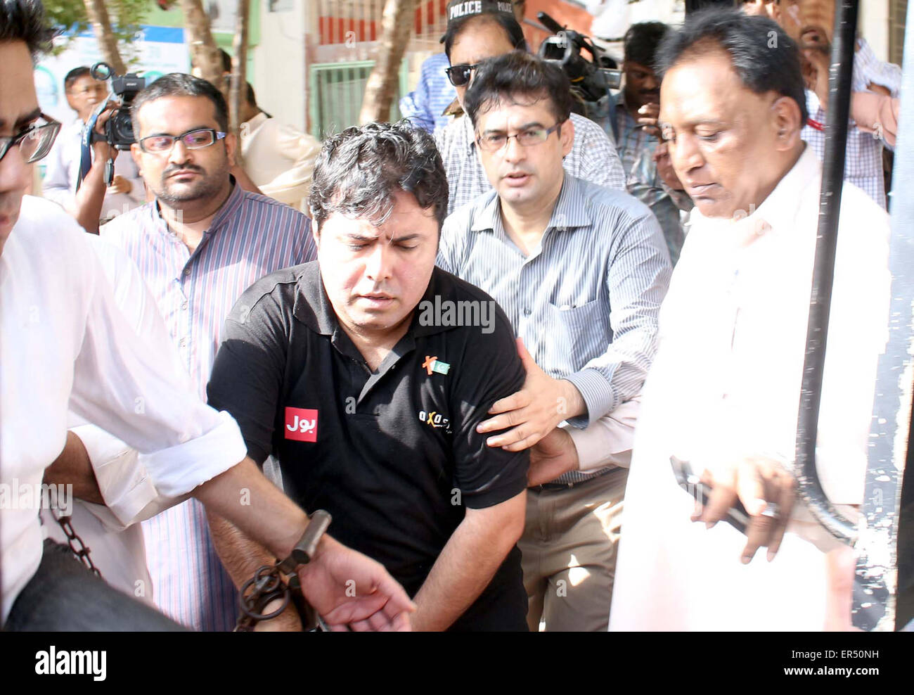 Pakistan. 27th May, 2015. CEO of Axact, Shoaib Sheikh is being ...