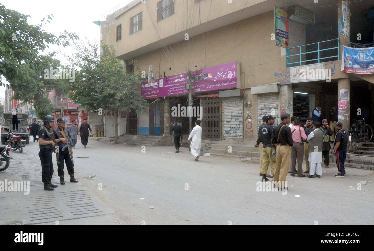 Pakistan. 27th May, 2015. Security staff cordon off crime scene where ...