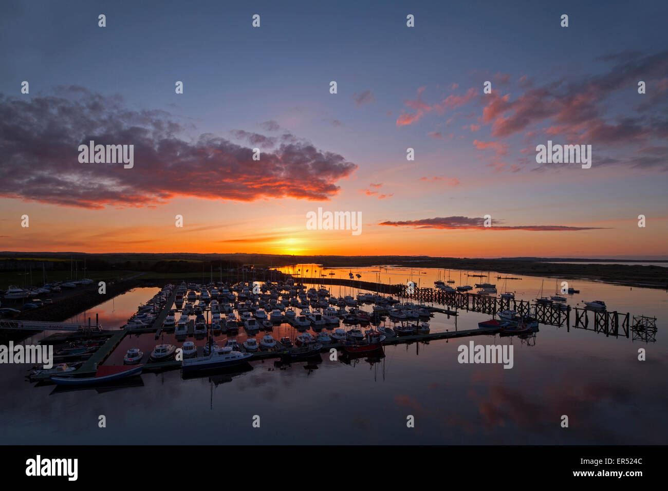A view of Amble marina in Northumberland in spring at sunset looking ...