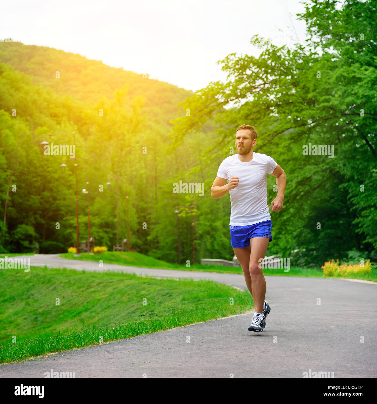 Running fitness man Stock Photo - Alamy