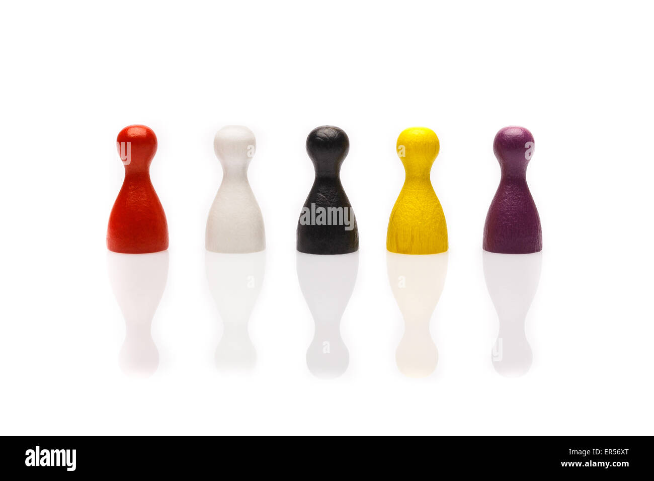 Concept: social, diversity, ethnicity. Several colored pawn figures ...
