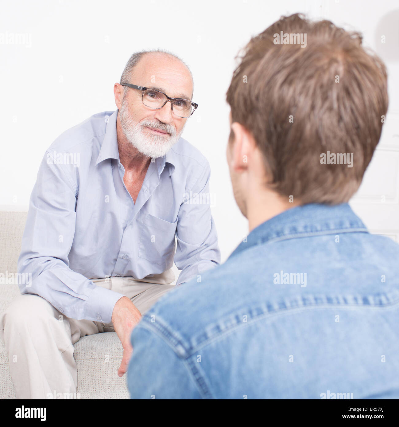family conversation between father and son Stock Photo - Alamy