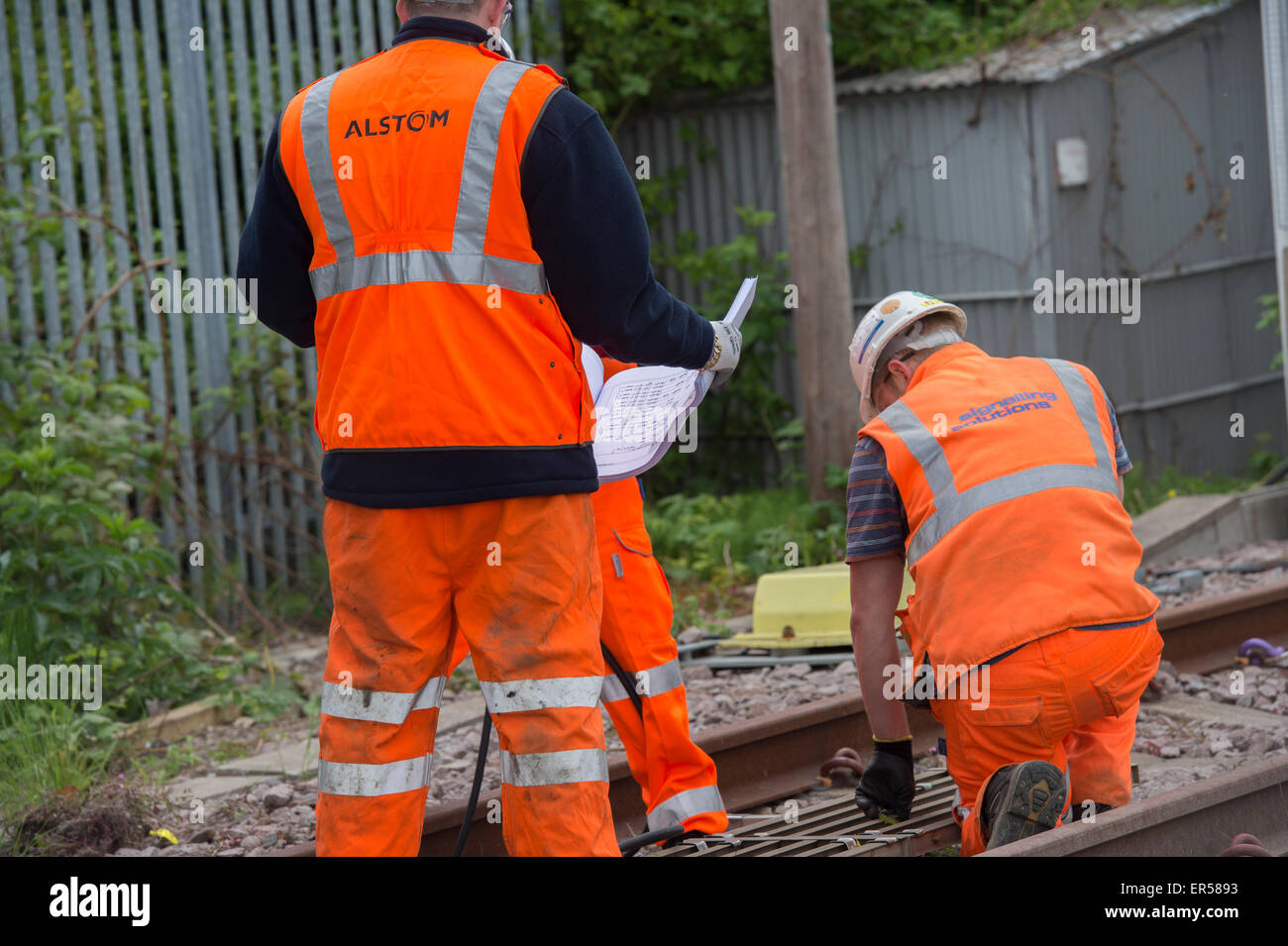 Railway workers from Signalling Solutions and Alstom working trackside ...