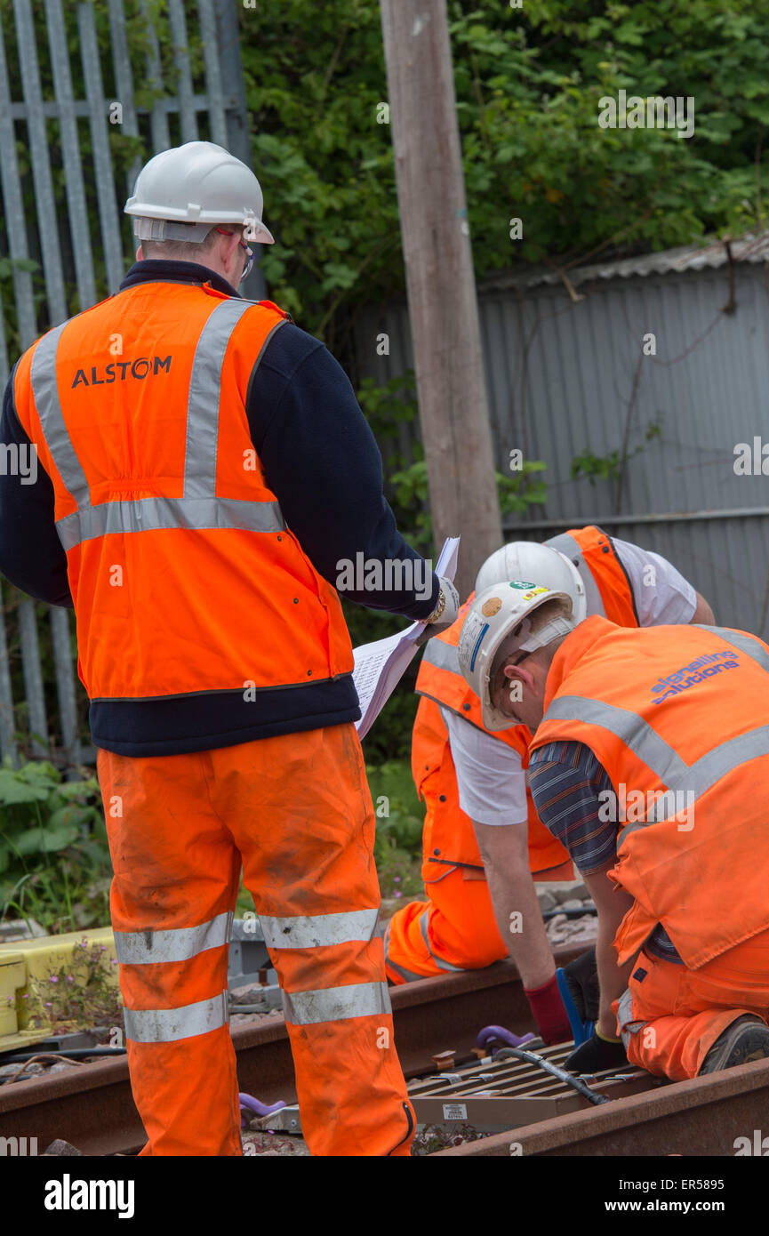Railway workers from Signalling Solutions and Alstom working trackside ...
