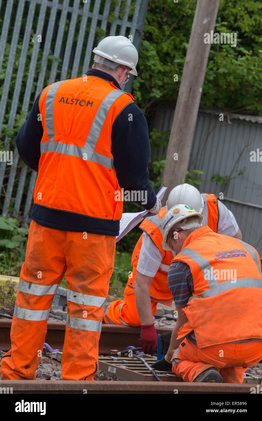 Railway workers from Signalling Solutions and Alstom working trackside ...