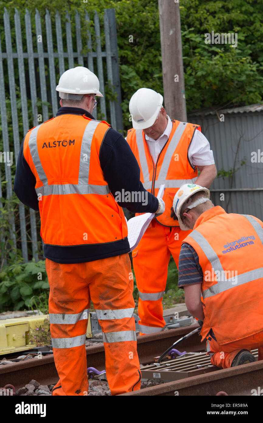 Railway workers from Signalling Solutions and Alstom working trackside ...