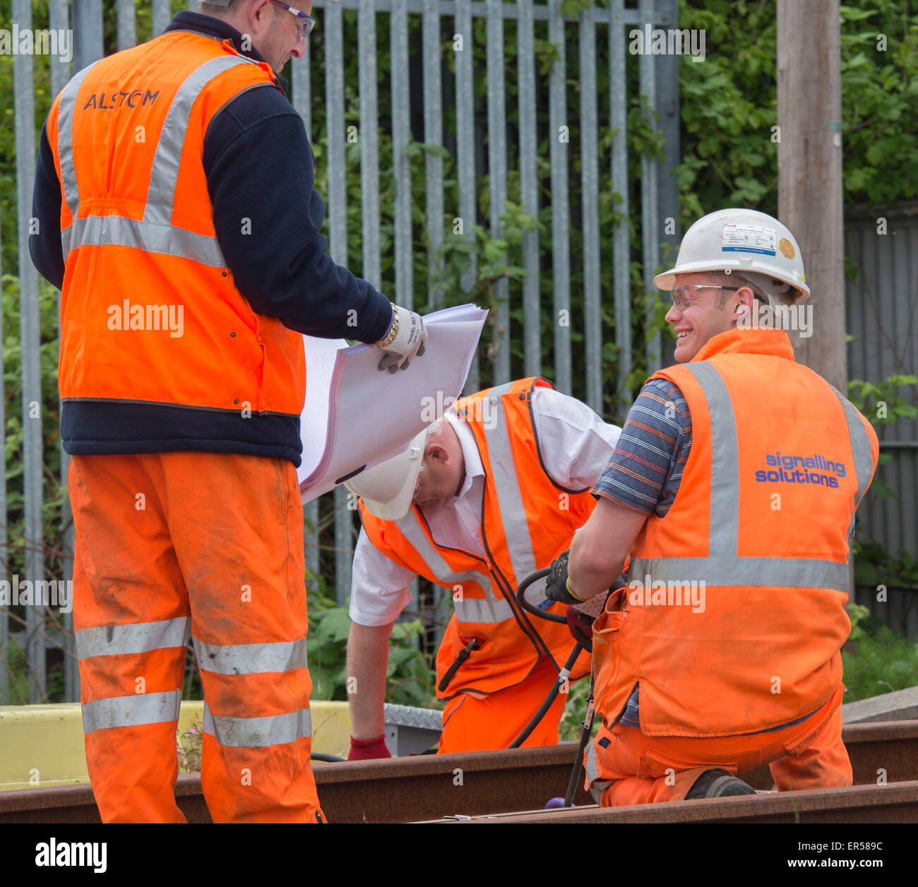 Railway workers from Signalling Solutions and Alstom working trackside ...