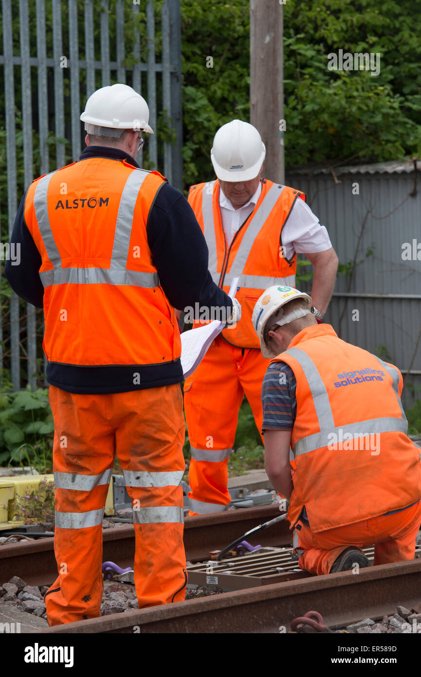 Railway workers from Signalling Solutions and Alstom working trackside ...