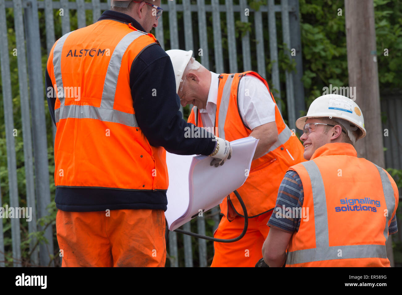 Railway workers from Signalling Solutions and Alstom working trackside ...