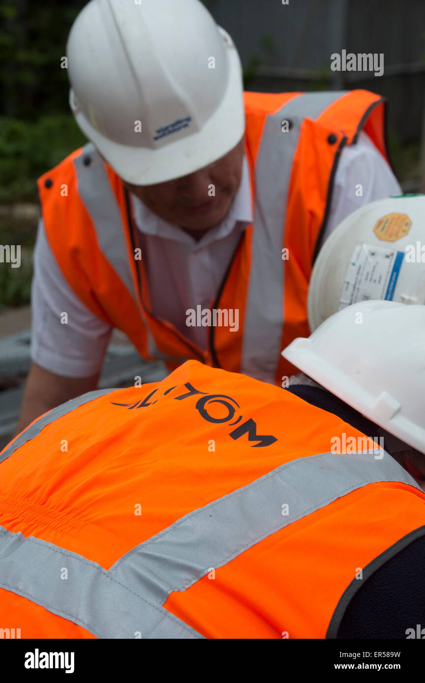 Railway workers from Signalling Solutions and Alstom working trackside ...