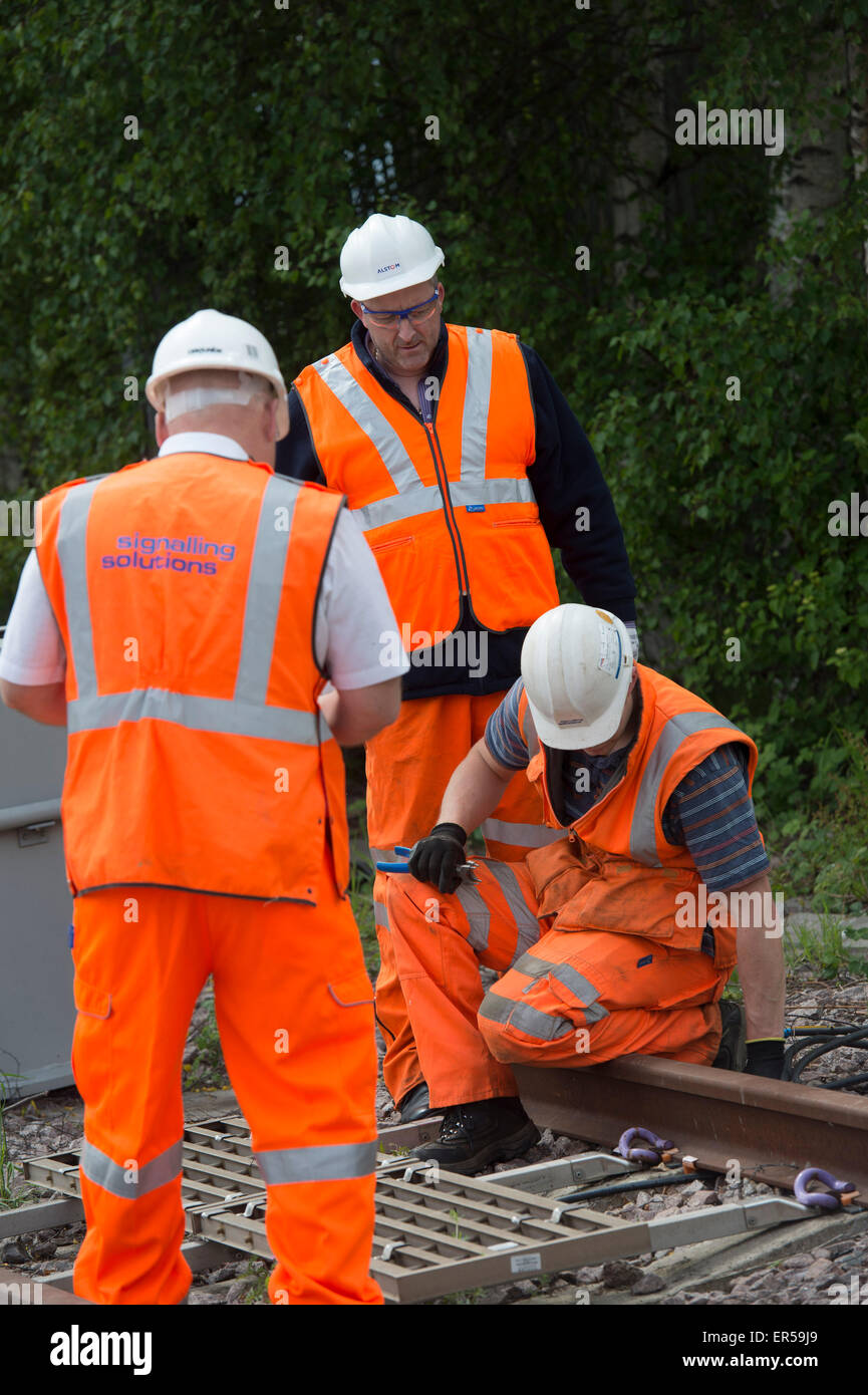 Railway workers from Signalling Solutions and Alstom working trackside ...