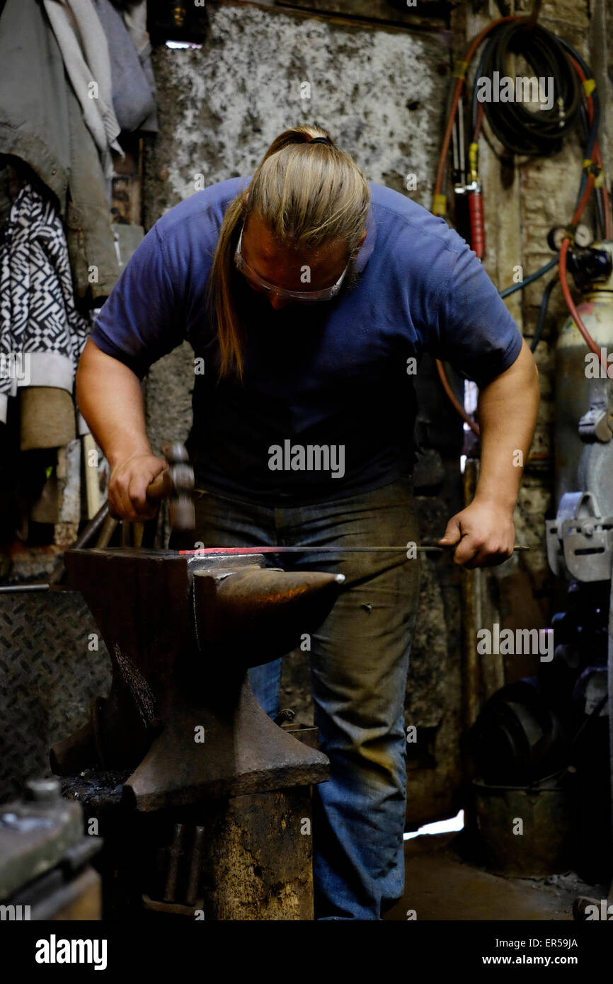 a blacksmith at work in his forge in southsea england uk Stock Photo ...