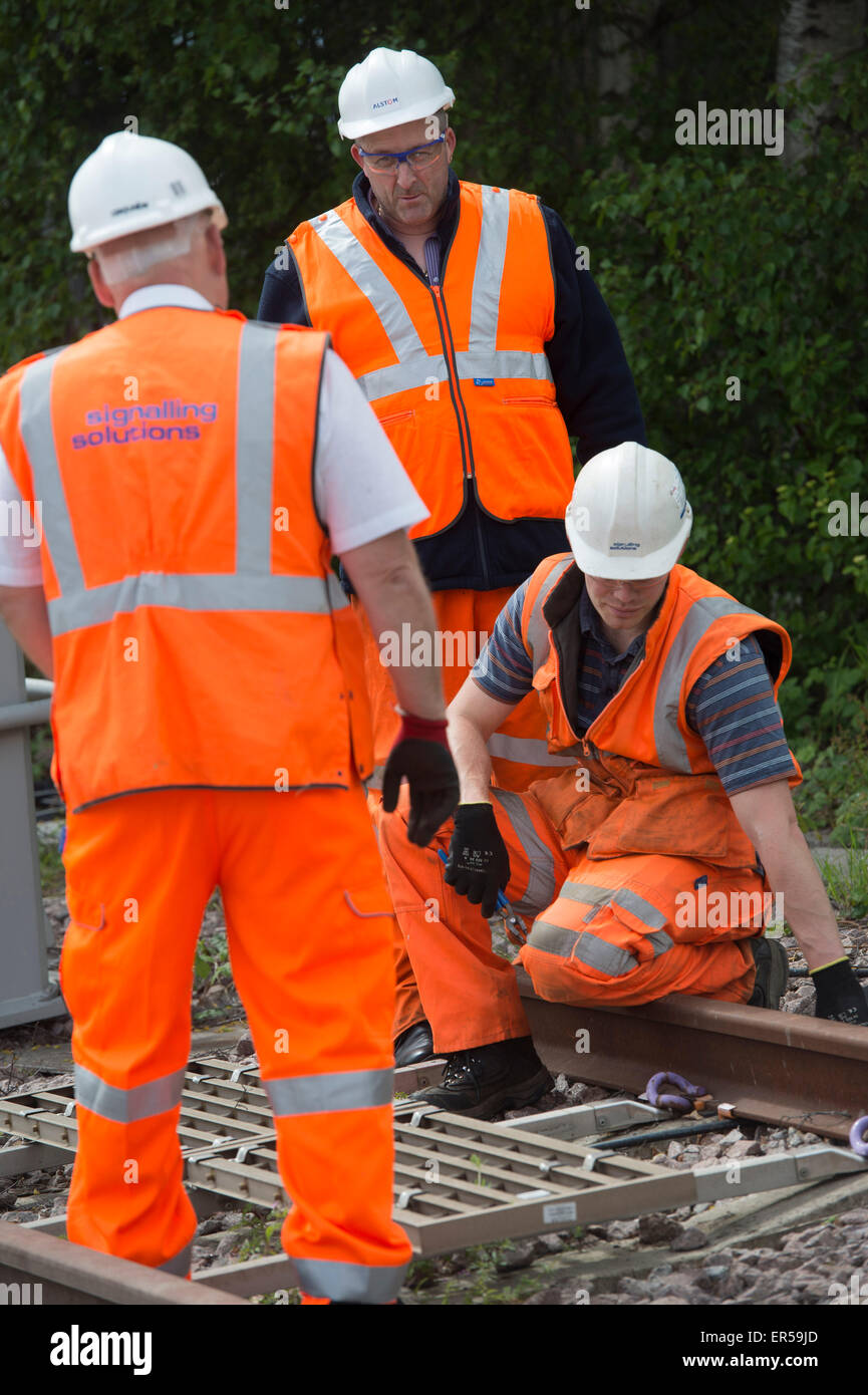 Railway workers from Signalling Solutions and Alstom working trackside ...