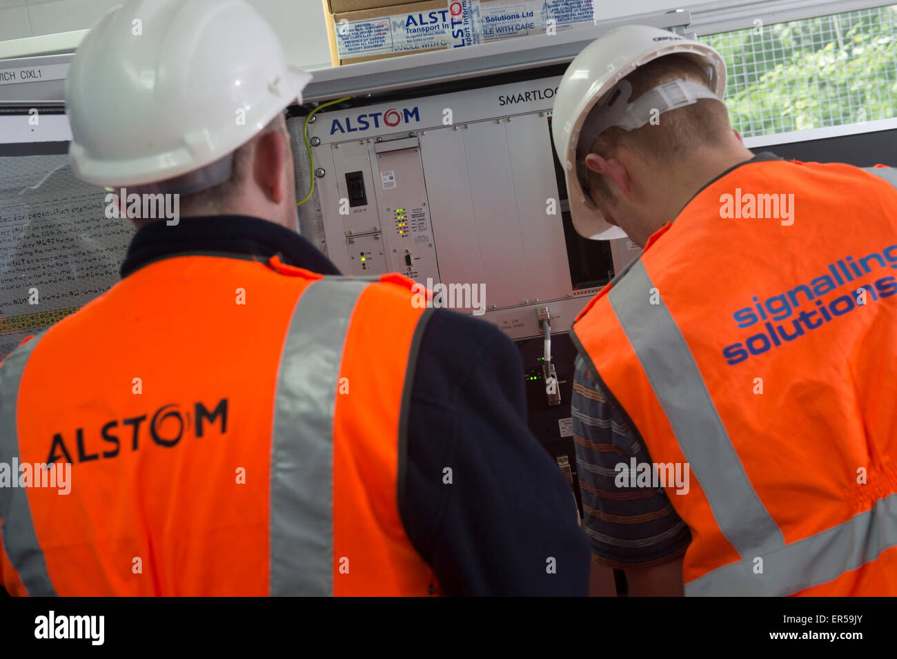 Railway workers from Signalling Solutions and Alstom working trackside ...
