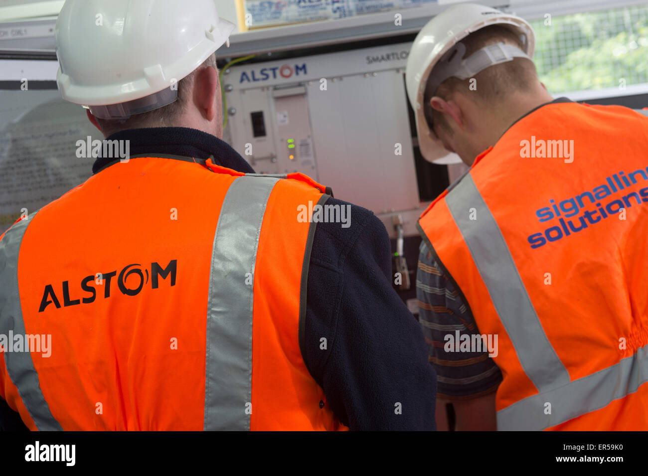 Railway workers from Signalling Solutions and Alstom working trackside ...