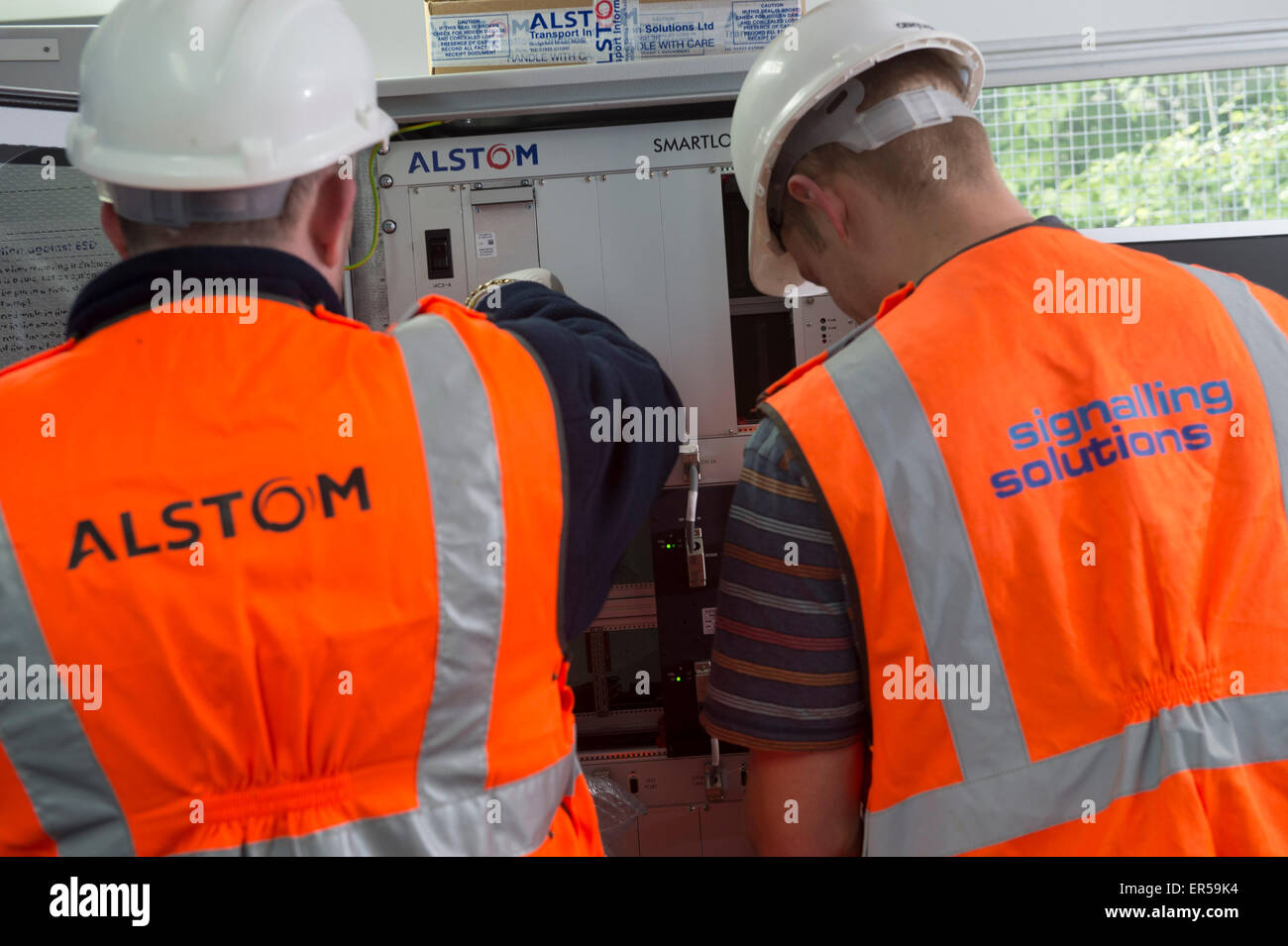 Railway workers from Signalling Solutions and Alstom working trackside ...