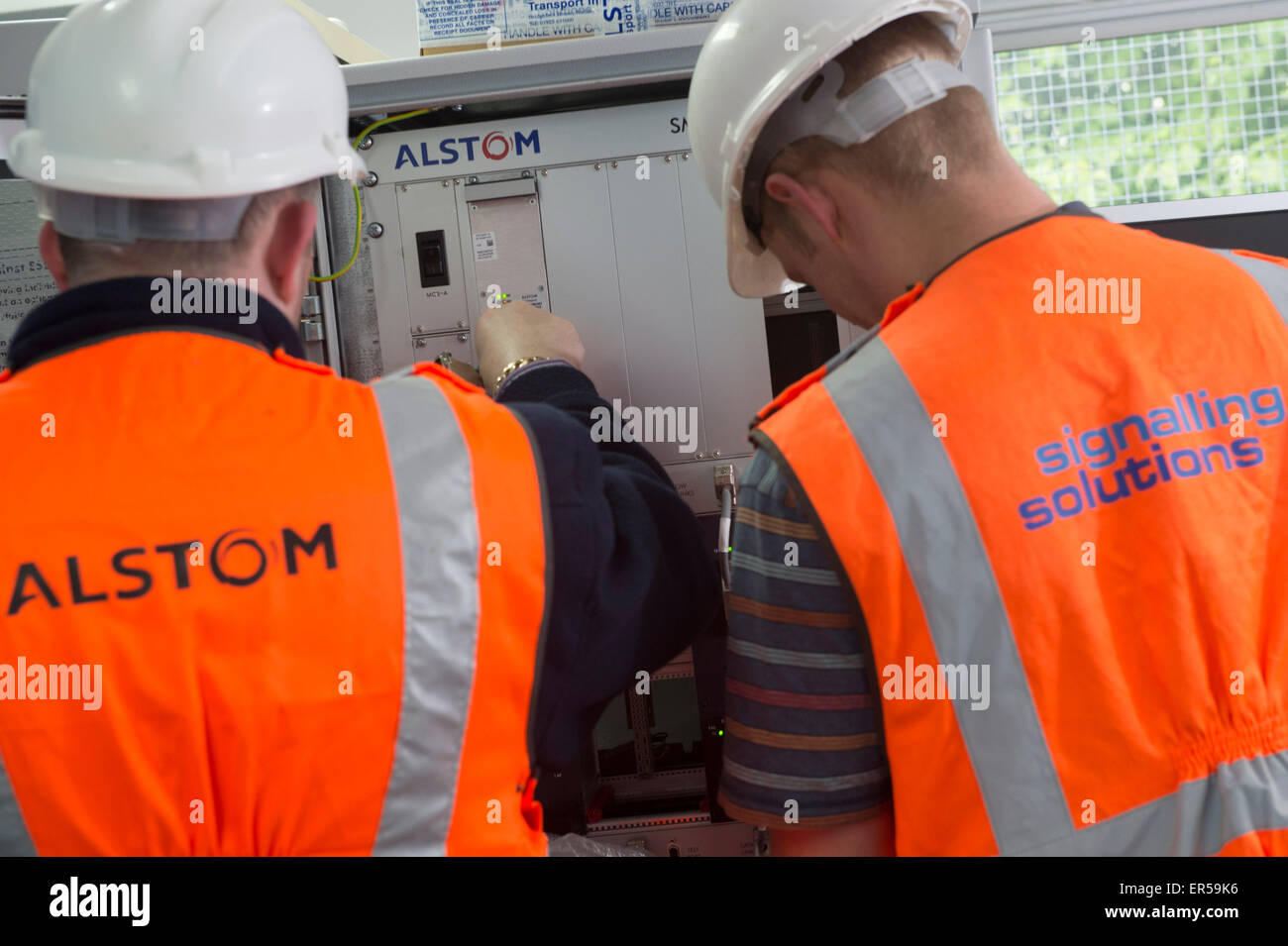 Railway workers from Signalling Solutions and Alstom working trackside ...