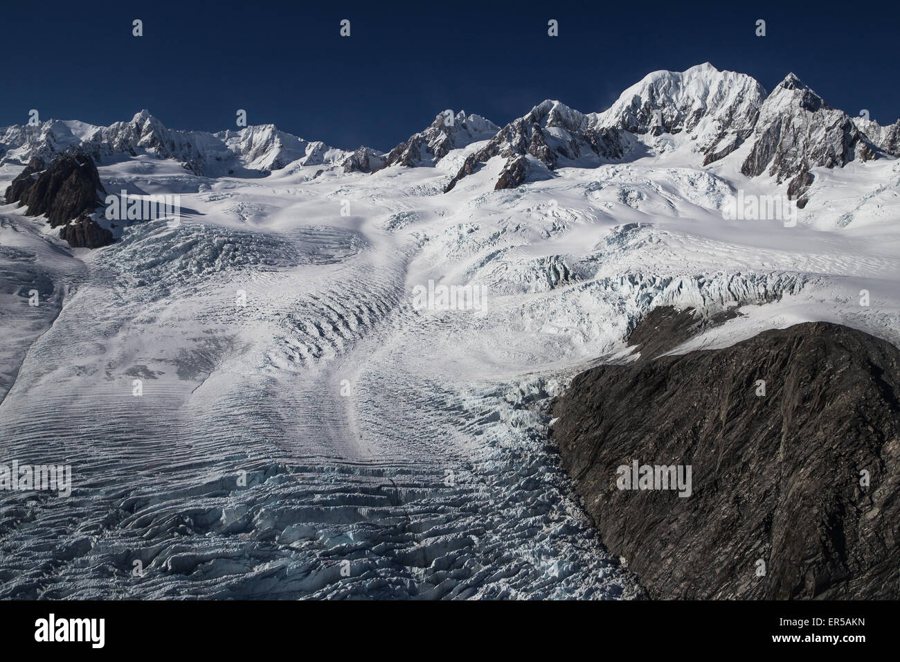 Fox Glacier and Mount Tasman are seen from an aerial perspective along ...