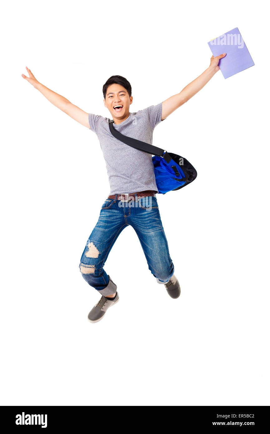 happy young man student jumping Stock Photo - Alamy